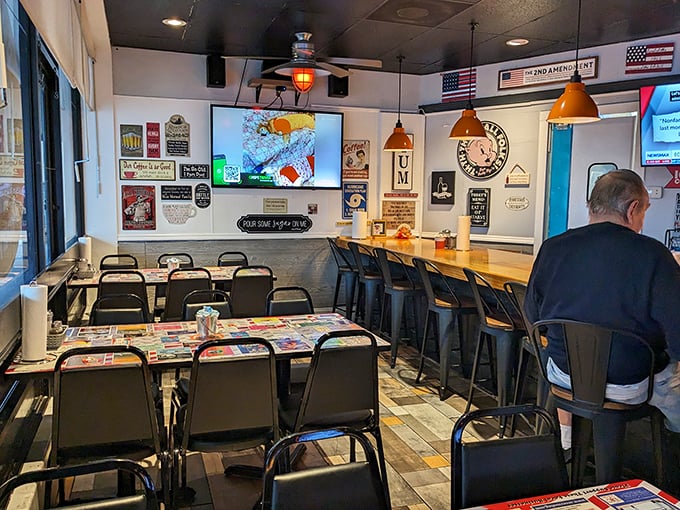 The counter seating area—where solo diners become regulars and the weather forecast comes with a side of local gossip.