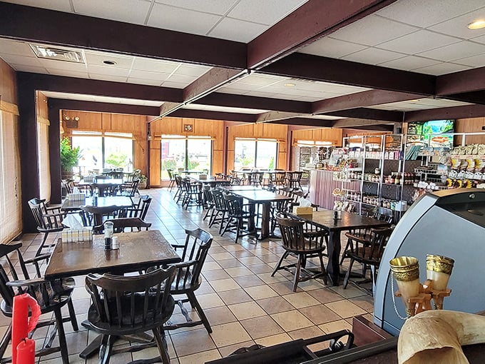 The dining room says "stay awhile" with its unpretentious charm. No designer lighting fixtures here—just honest space for honest food.