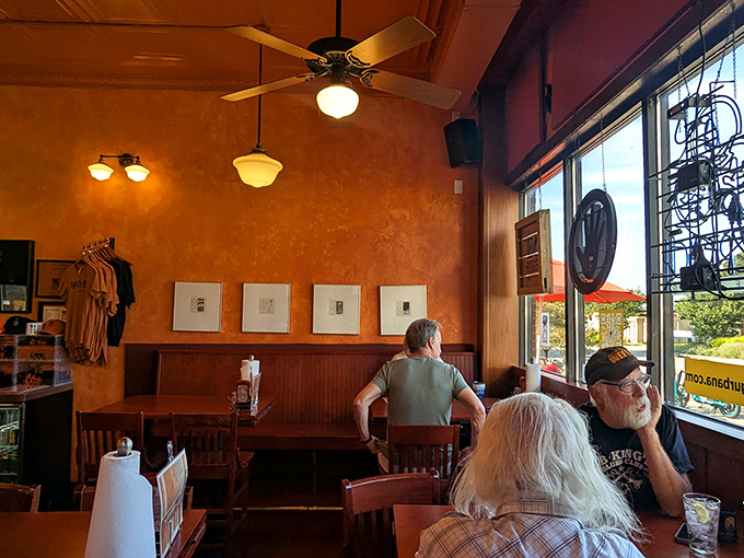 The dining room where barbecue dreams come true. Those orange walls have witnessed countless "first bite" faces of pure joy.