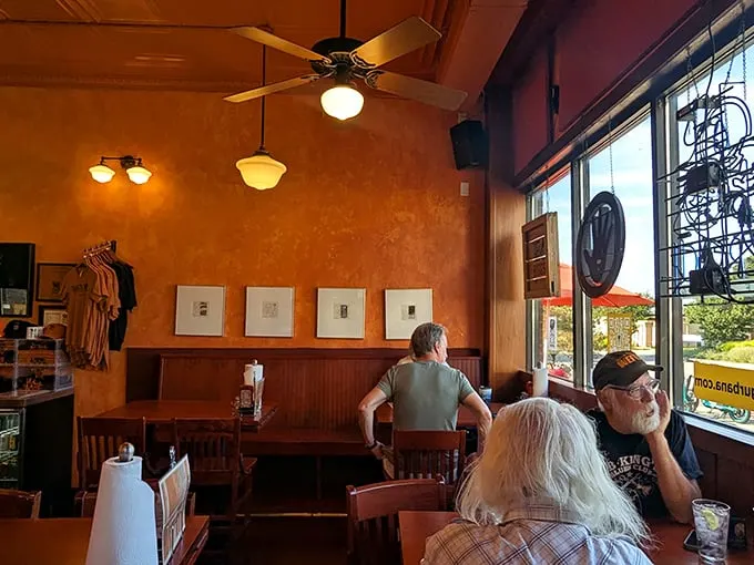 The dining room where barbecue dreams come true. Those orange walls have witnessed countless "first bite" faces of pure joy.