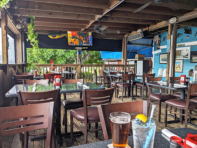 The covered dining deck offers the perfect blend of shade and scenery – because sunburn shouldn't be on the menu with your seafood
