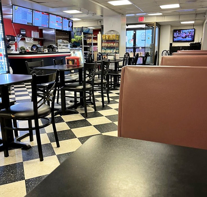 The dining area has that lived-in comfort of your favorite jeans—not fancy, but exactly right for the serious business of sandwich enjoyment.
