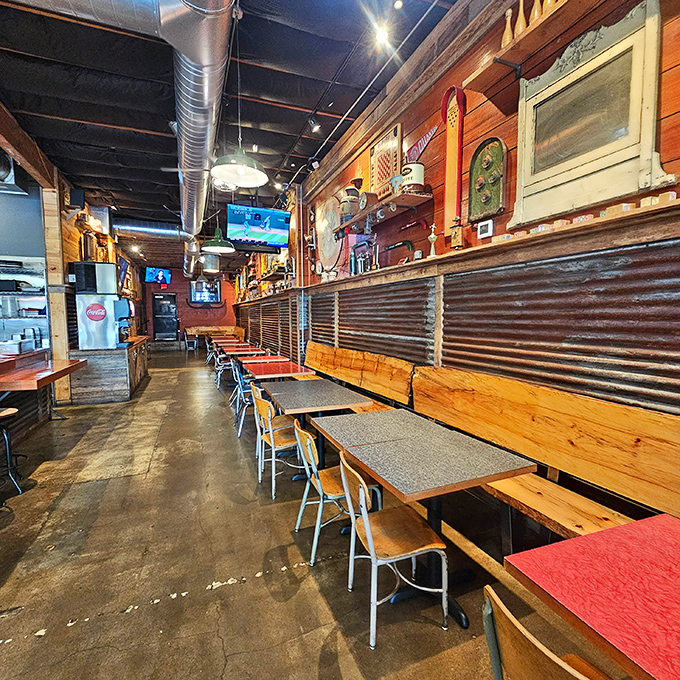 The dining area feels like the clubhouse you always wanted as a kid—if that clubhouse served life-changing chicken and had excellent beer.