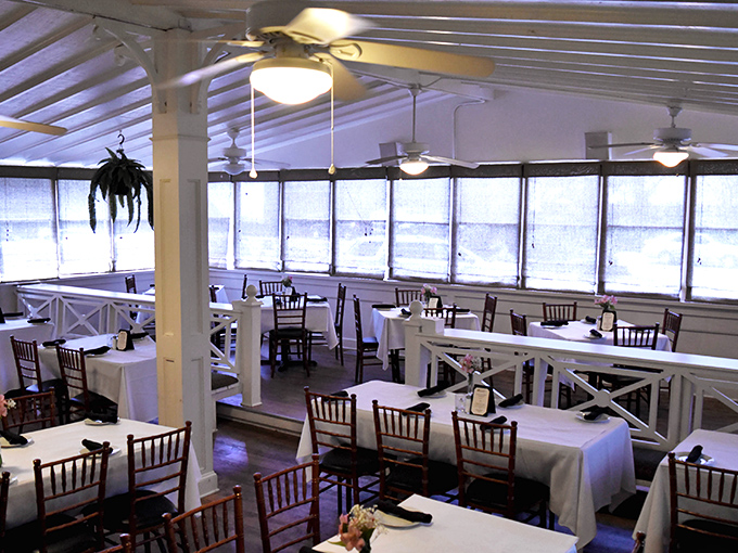 The bright, airy dining space feels like eating in a sophisticated friend's sunroom—if that friend happened to be an exceptional chef.