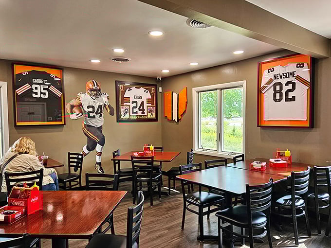Browns jerseys watch over diners like protective spirits. In this temple of casual dining, every meal comes with a side of Cleveland pride.