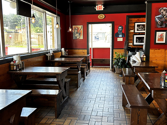 Red walls and wooden booths create the perfect backdrop for the serious business of barbecue consumption—no white tablecloths needed where sauce reigns supreme.