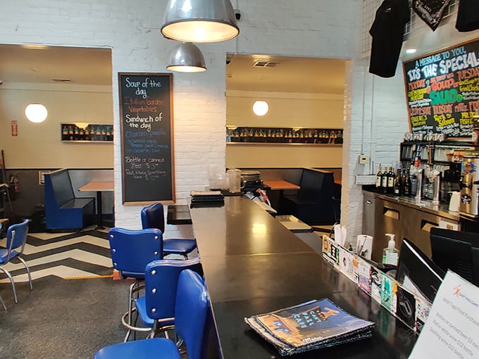 Clean lines, white brick walls, and that classic diner counter where strangers become friends over shared condiments and coffee refills.