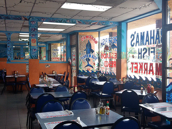 The dining area's colorful maritime murals remind you that these creatures once swam free—before making the noble sacrifice to your appetite.