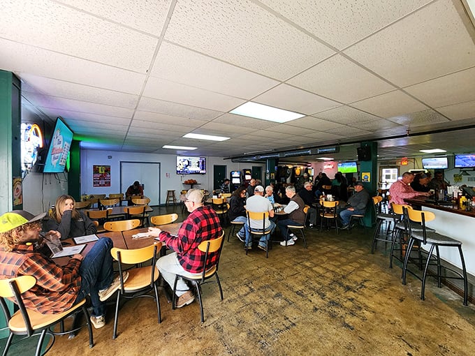 Daytime at The Backroom shows its versatile charm—TVs for sports fans, tables for hungry patrons, and that welcoming neighborhood vibe.