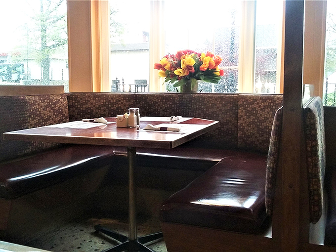 Booth seating with a view—where countless conversations have unfolded over plates of eggs and endless cups of coffee.