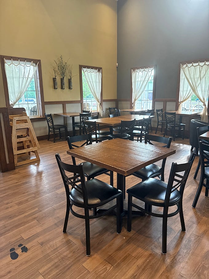 The dining area feels like the farmhouse living room you wish you had. Those wooden tables have witnessed countless ice cream epiphanies.