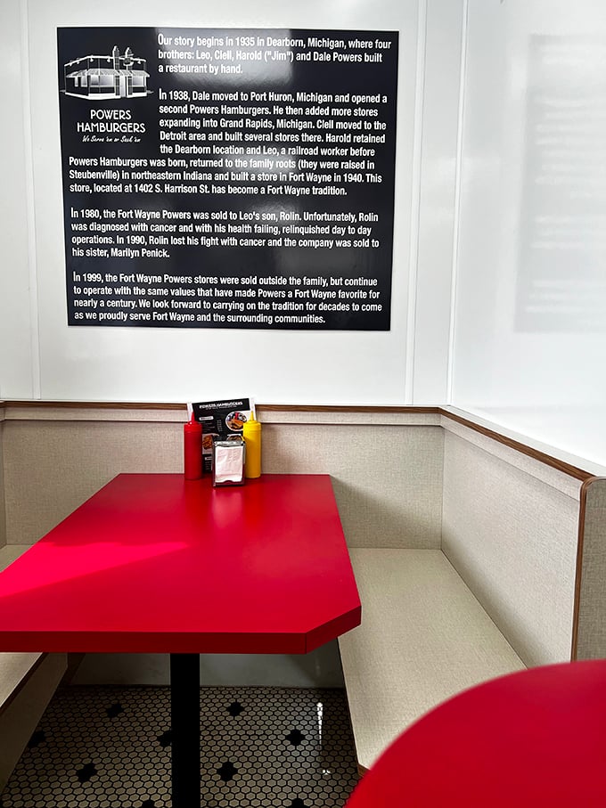 The booth tells stories of countless conversations, first dates, and regular customers who've made this corner table their second home.