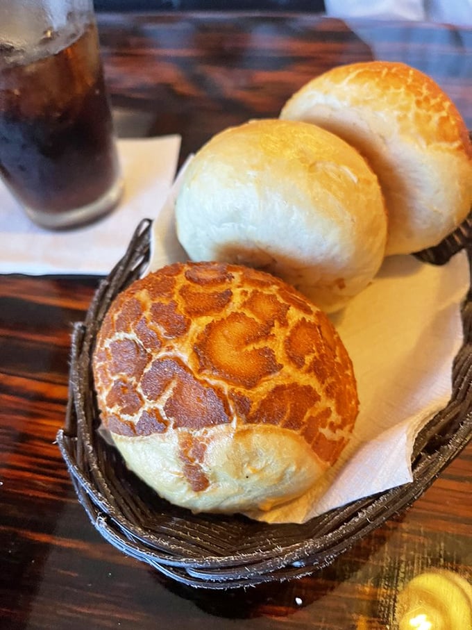 The bread basket at Captain Anderson's features rolls with that perfect crackling exterior—nature's way of saying "good things come to those who break bread."