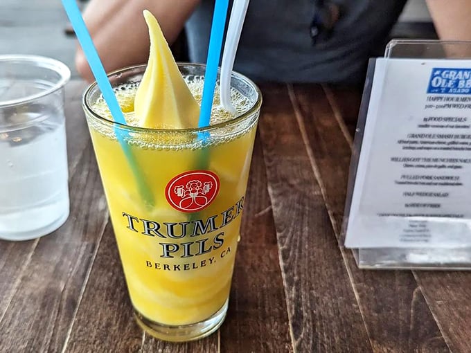 A frosty Dole Whip—the tropical vacation your taste buds need between bites of smoky meat. Sweet intermission in a glass.