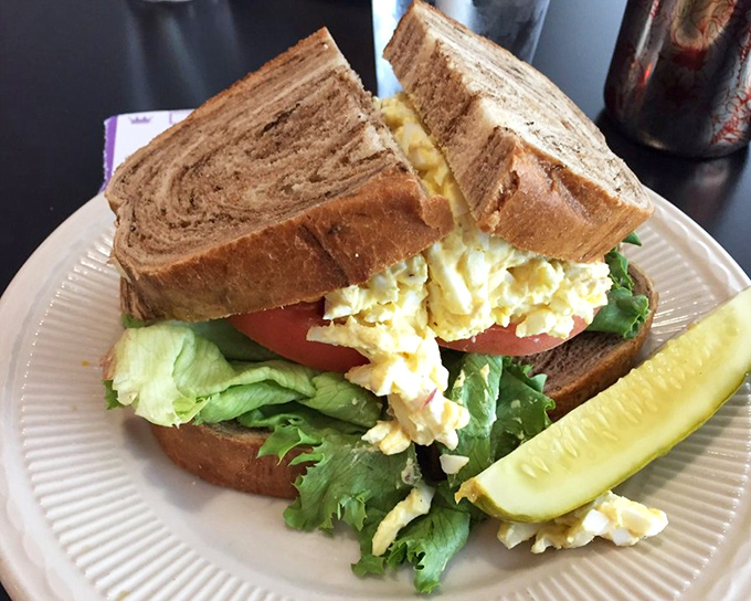 The humble egg salad sandwich, elevated to an art form. Fresh, simple ingredients arranged with care—the way lunch should be.