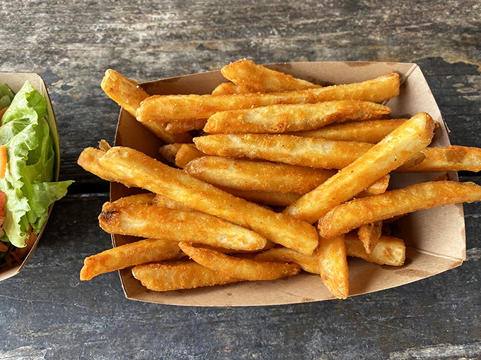 French fries so perfectly golden they deserve their own Instagram account. Crispy on the outside, fluffy inside – the supporting actor that steals every scene.