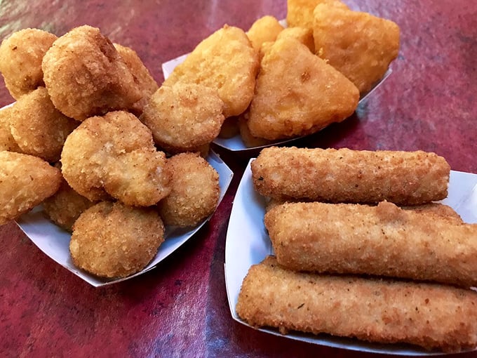 Fried appetizers that turn waiting for your main course into its own culinary event – golden, crispy perfection that demands to be dunked.
