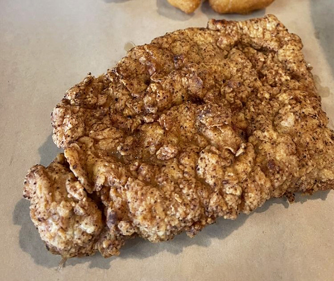 This isn't just a fried porkchop—it's what other fried porkchops dream of becoming when they grow up.