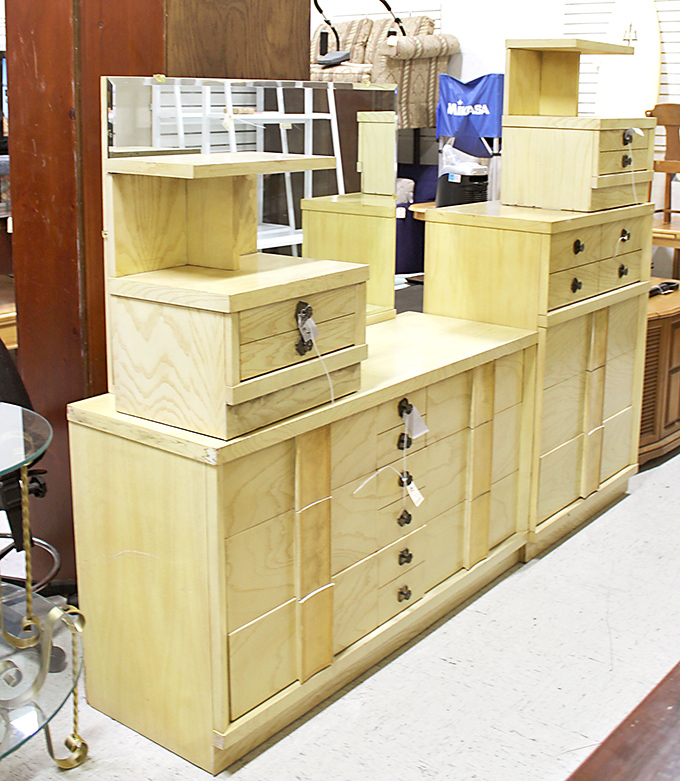 Mid-century modern meets contemporary in this blonde wood furniture display. Don Draper would approve of these clean lines.