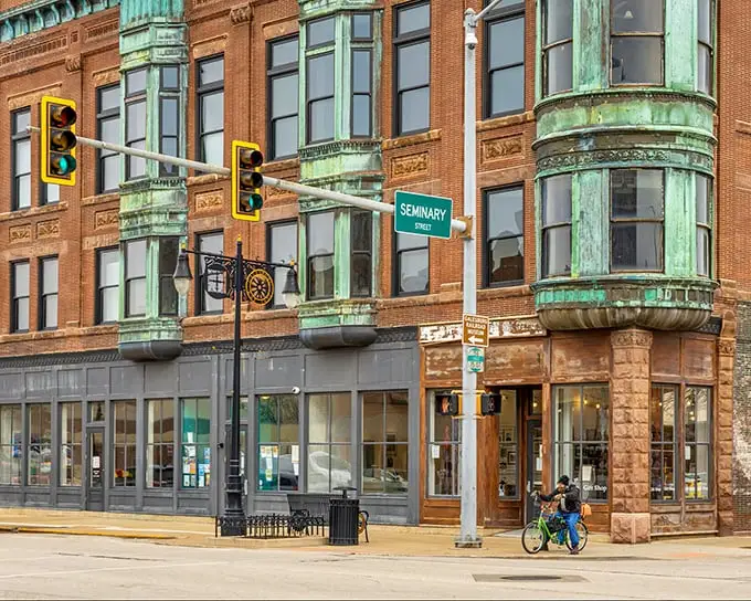 That patina on the copper-green architectural details isn't just age—it's character, something Galesburg's downtown has in abundance at the corner of Seminary Street.
