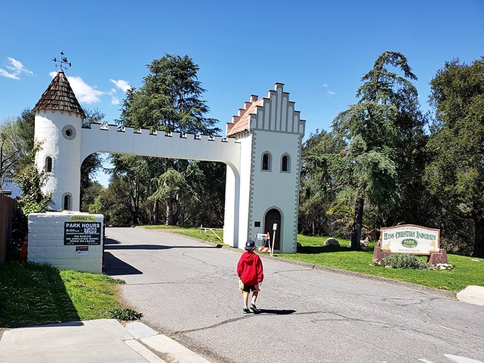 A child walks toward adventure at Hans Christian Andersen Park—proof that some experiences are magical at any age.