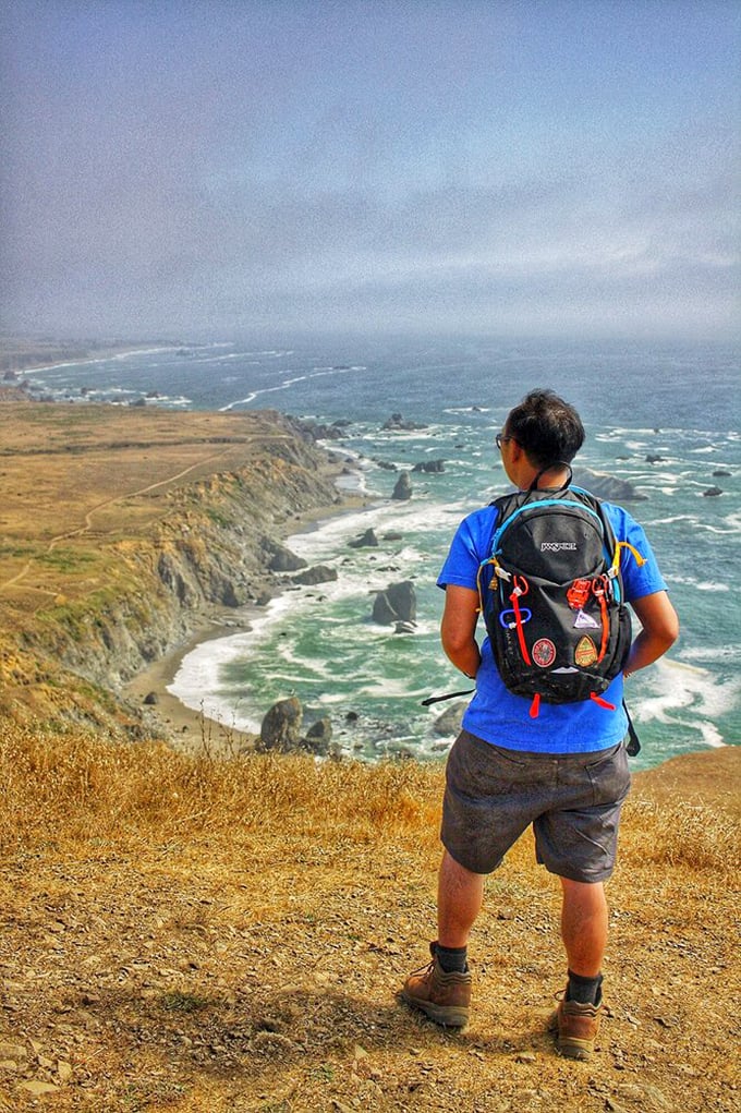 Sometimes the best view comes after the climb. This hiker found the perfect spot to contemplate life's big questions—or just appreciate not being at a desk.