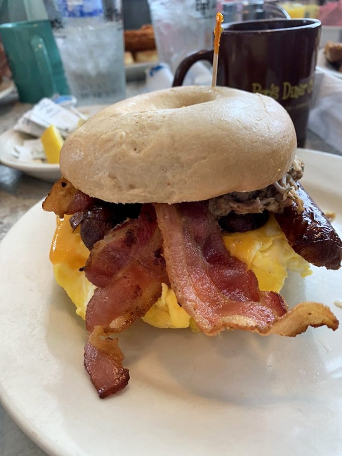 This breakfast sandwich defies gravity and good manners—you'll need both hands and several napkins for this beautiful monster.
