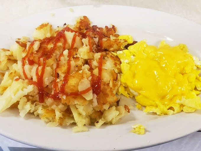 
Home fries with a splash of ketchup and eggs so yellow they could brighten a cloudy day. Breakfast perfection doesn't need to be complicated. 