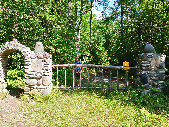 Stone pillars mark the entrance to another world—one where "no service" refers to cell phones, not restaurant complaints.