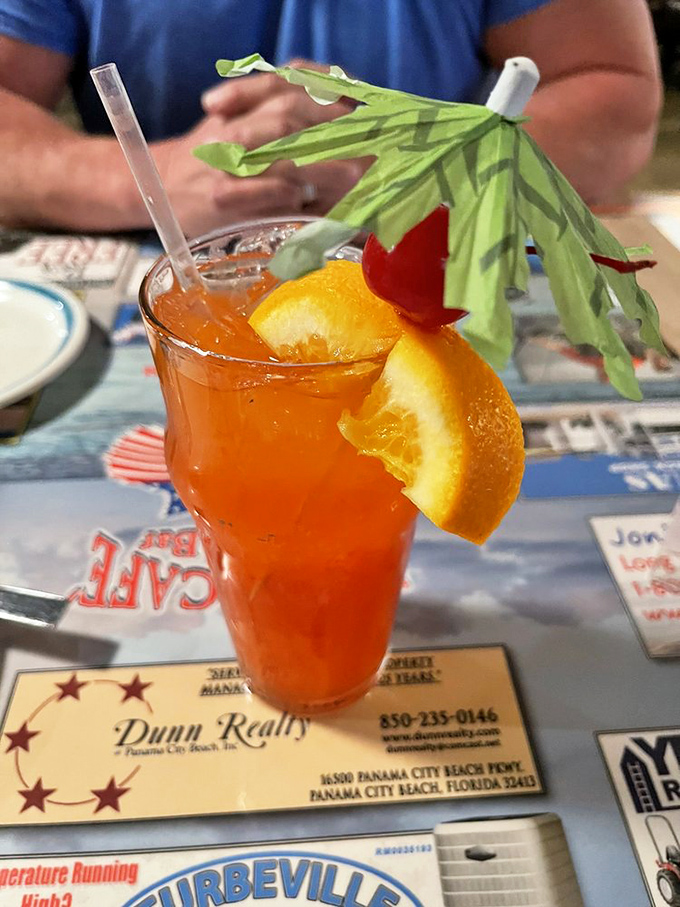 Not just a drink, but a tropical vacation in a glass. That little paper umbrella isn't decoration—it's protecting your hurricane from getting sunburned.