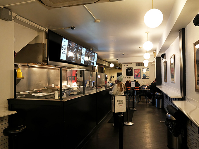 Where the magic happens – order counter, open kitchen, and the promise of imminent satisfaction. Anticipation builds with every step forward.
