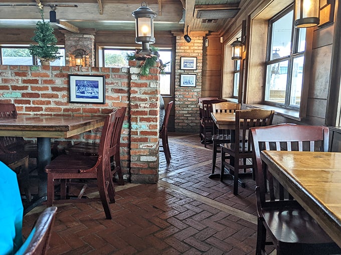 Brick pillars and herringbone floors create the perfect stage for seafood stardom. This isn't decoration—it's maritime method acting.