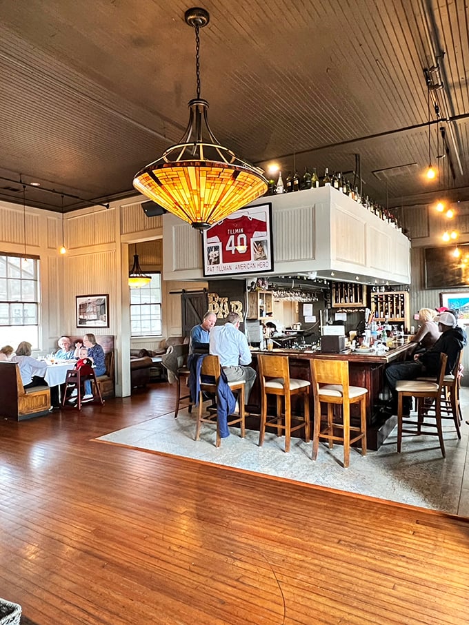 The bar area beckons with Tiffany-style lighting and that unmistakable warmth of genuine Southern hospitality.