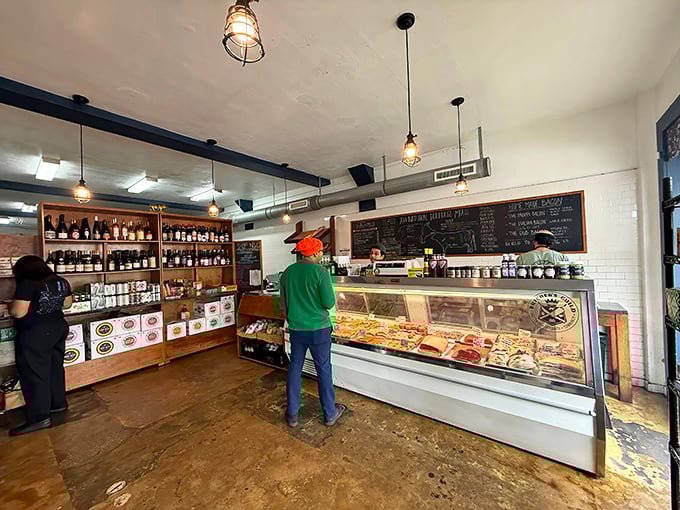 From this angle, you can almost smell the meaty perfection awaiting behind that gleaming glass case—a butcher shop that feels like a gallery opening.