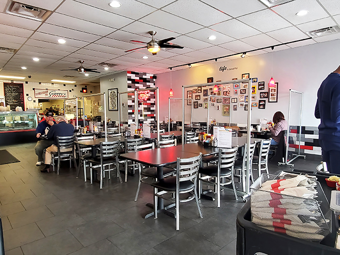 The dining room balances cozy and spacious. Those black and red accents aren't just design choices—they're setting the stage for serious eating.