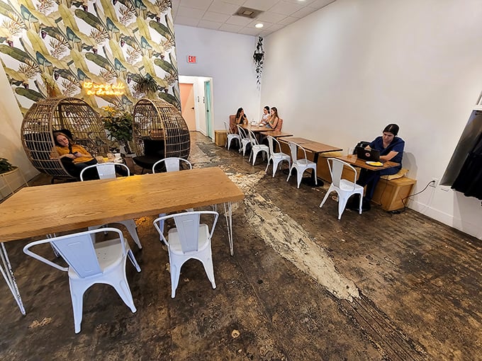 The kind of space where creative thoughts flourish – wicker egg chairs and botanical wallpaper create Orlando's answer to a Balinese coffee retreat.