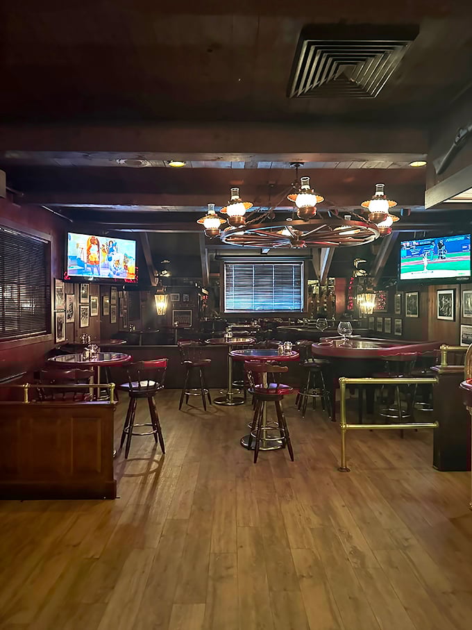 The bar area's warm glow, wagon wheel lighting, and TVs create that perfect "treat yourself but feel at home" vibe that makes Aberdeen Barn special.