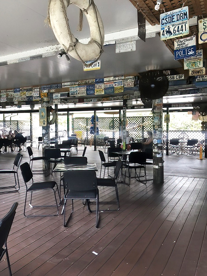 License plates from across America line the ceiling – each one a testament to a road trip that found its perfect ending.