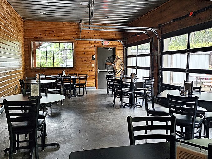 Another angle of dining nirvana. The garage-style doors let in natural light while the pine walls make you feel like you're dining in a luxurious cabin. 