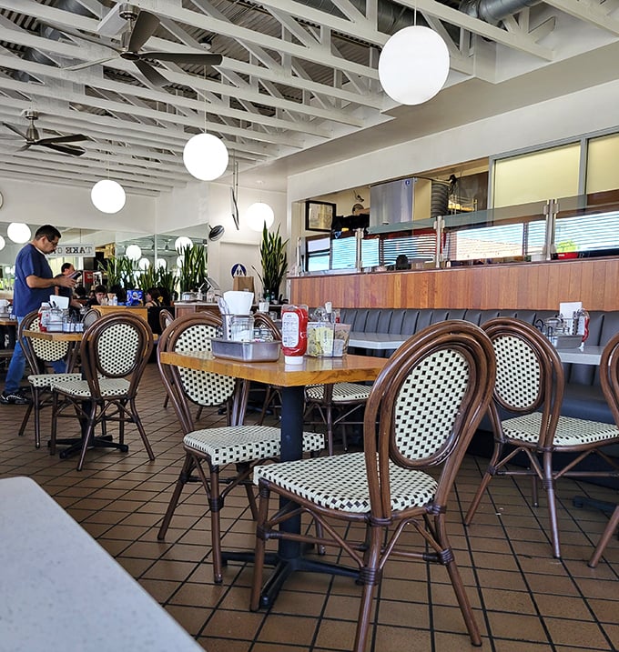 Bistro chairs and wooden tables create that perfect "I've discovered something special" atmosphere that makes regulars out of first-timers.