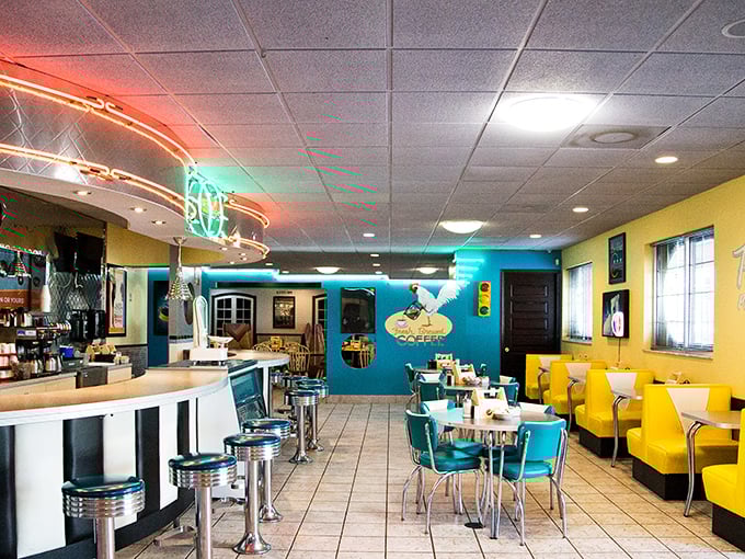 The neon palm tree and classic car imagery aren't just decoration—they're time-travel devices taking you back to when diners were America's living rooms.