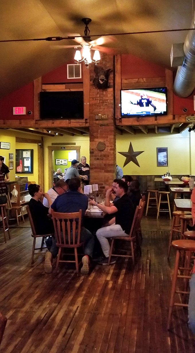 The dining room buzzes with satisfied customers sharing stories over plates of exceptional barbecue and cold beverages.