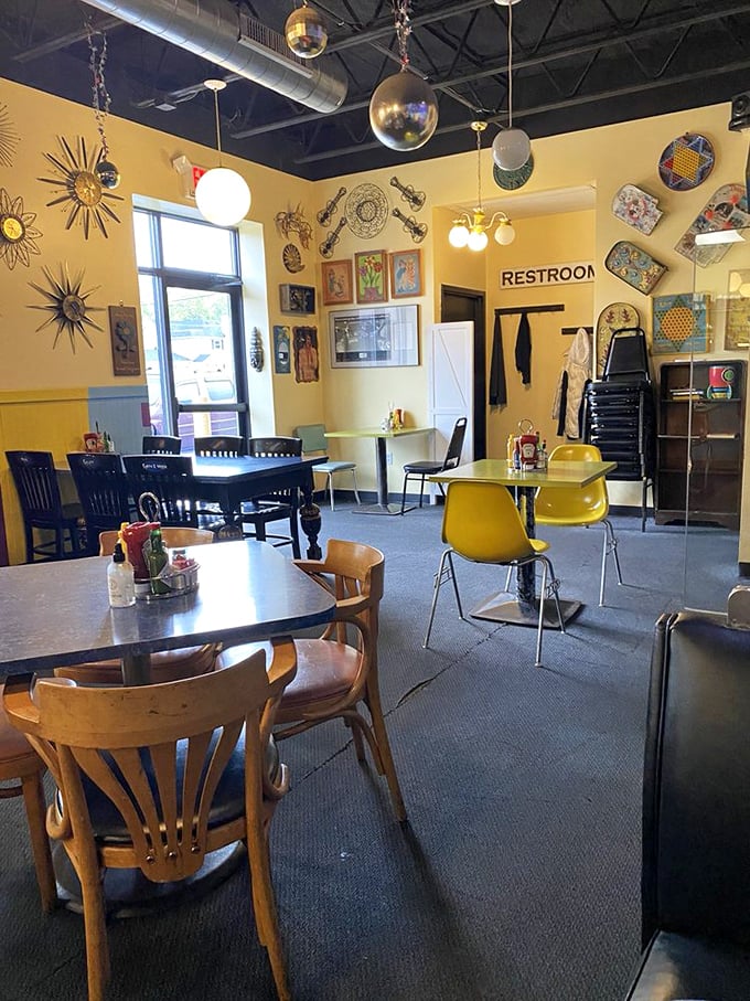 Sunshine on the walls and in your soul – the diner's interior is a masterclass in cheerful chaos, where every sun-shaped decoration seems to wink at you.