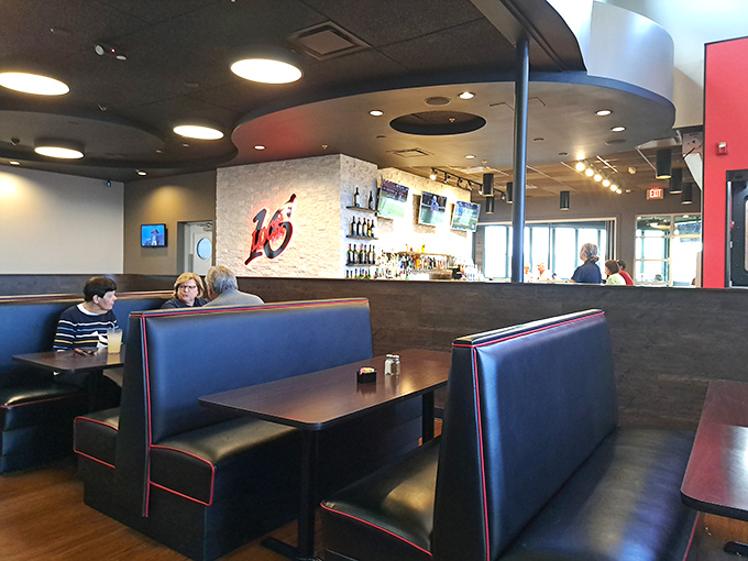 Comfortable booths with that perfect balance of privacy and people-watching potential – the dining equivalent of having your cake and eating it too.