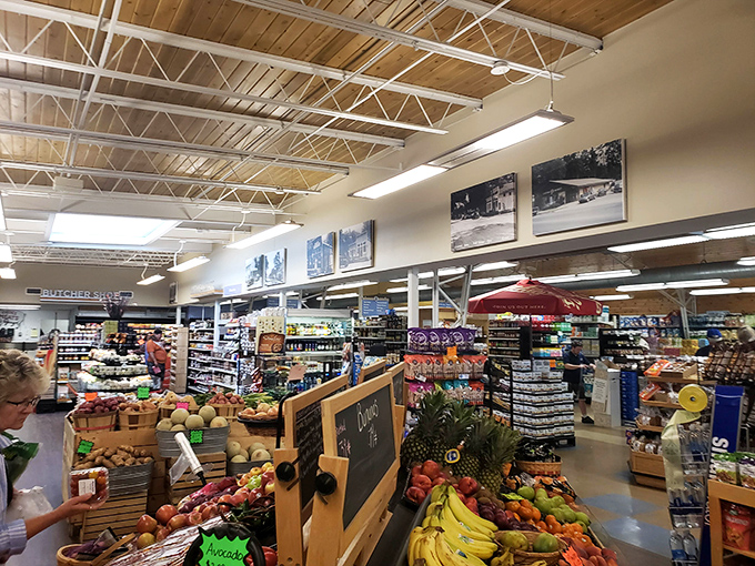 The produce section proudly displays Michigan's bounty in rustic wooden crates—proof that "eating local" isn't just trendy, it's delicious.
