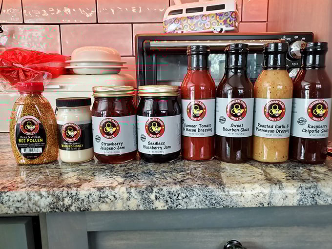 Mason jars filled with homemade goodness line up like edible soldiers. Strawberry jam and blackberry preserves—the sweet taste of someone's grandmother's recipe.