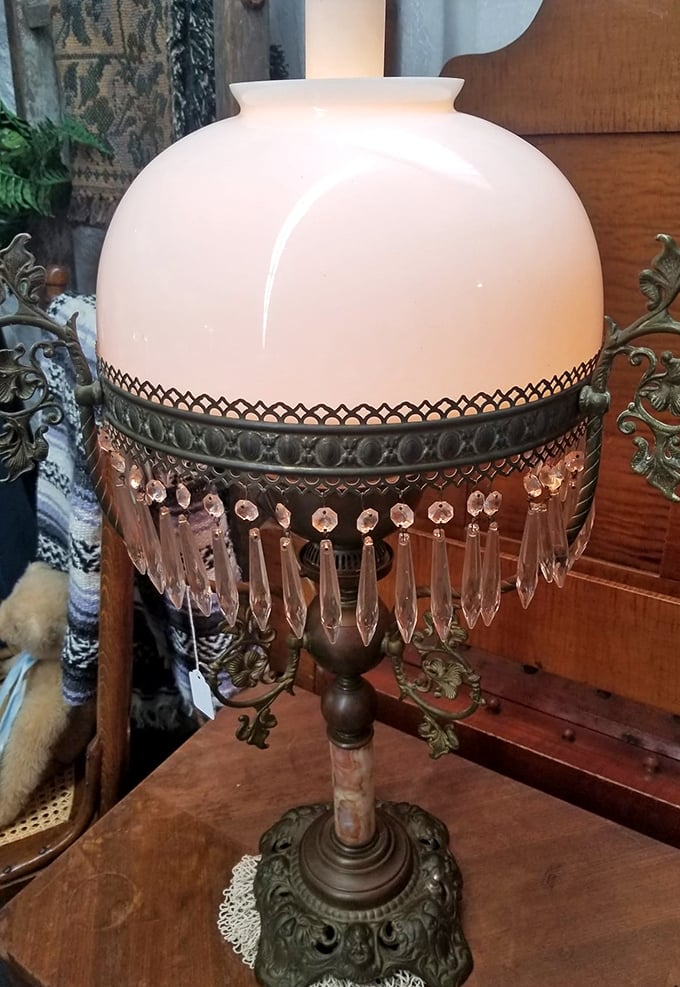 This isn't just a lamp—it's functional art with its milky glass shade and crystal pendants. Edison would be impressed, and your living room will be transformed.