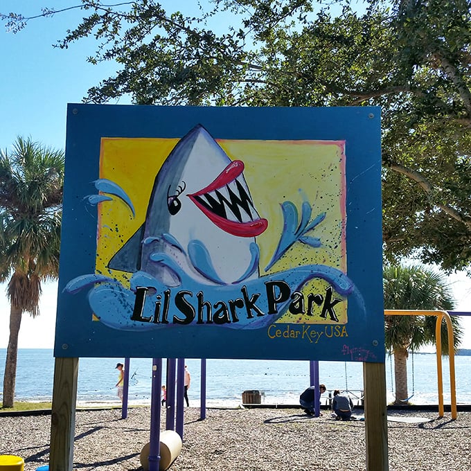 Lil Shark Park's whimsical sign proves Cedar Key doesn't take itself too seriously—even their playground mascots have personality.