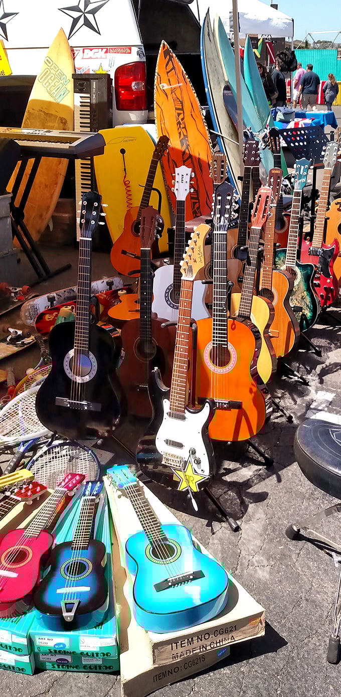 The musician's corner – where guitars of every color await their next serenade, alongside surfboards ready for their next wave.