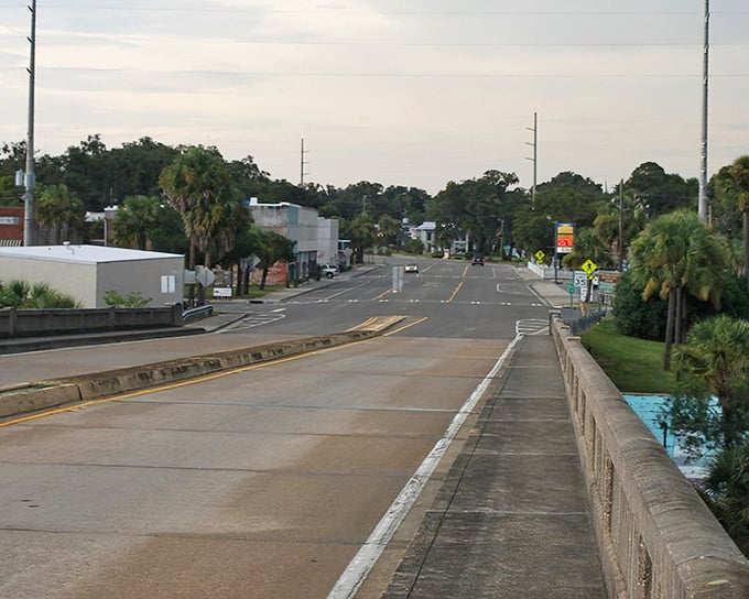 Darien's bridge offers a perfect vantage point of the town's quiet main street – where rush hour means three cars might arrive at the stop sign simultaneously.